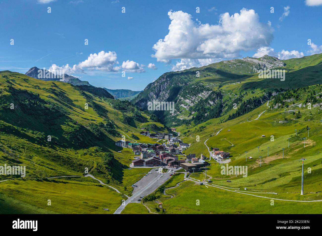 Aerial view to the impressive mountain ranges around the Flexenpass in ...
