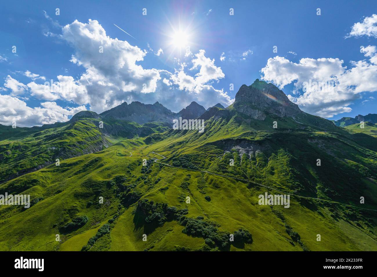Aerial view to the impressive mountain ranges around the Flexenpass in ...