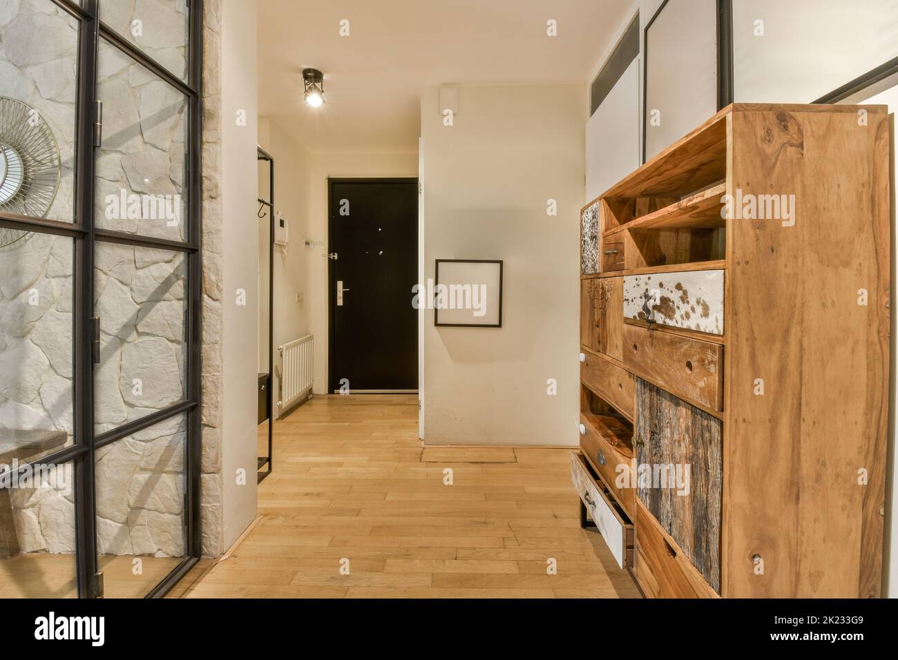 Narrow corridor with closet and cabinet Stock Photo - Alamy