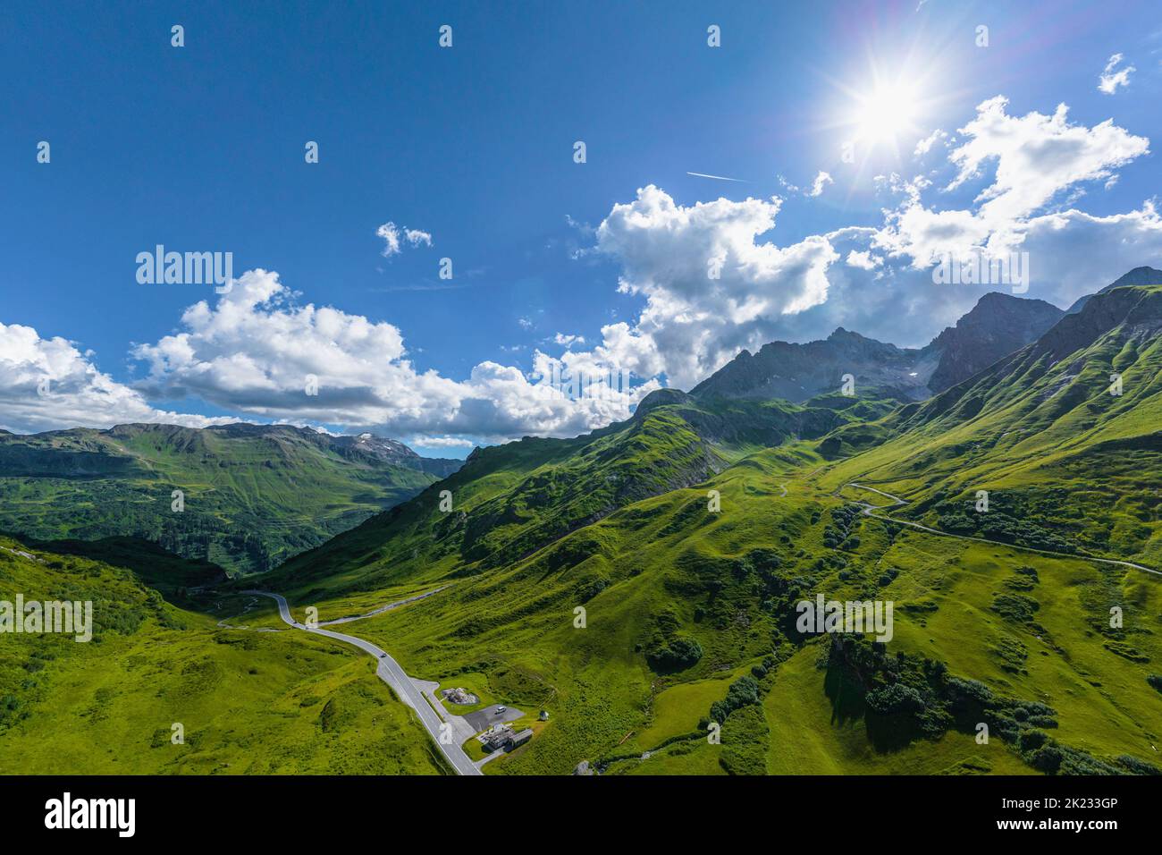Aerial view to the impressive mountain ranges around the Flexenpass in ...