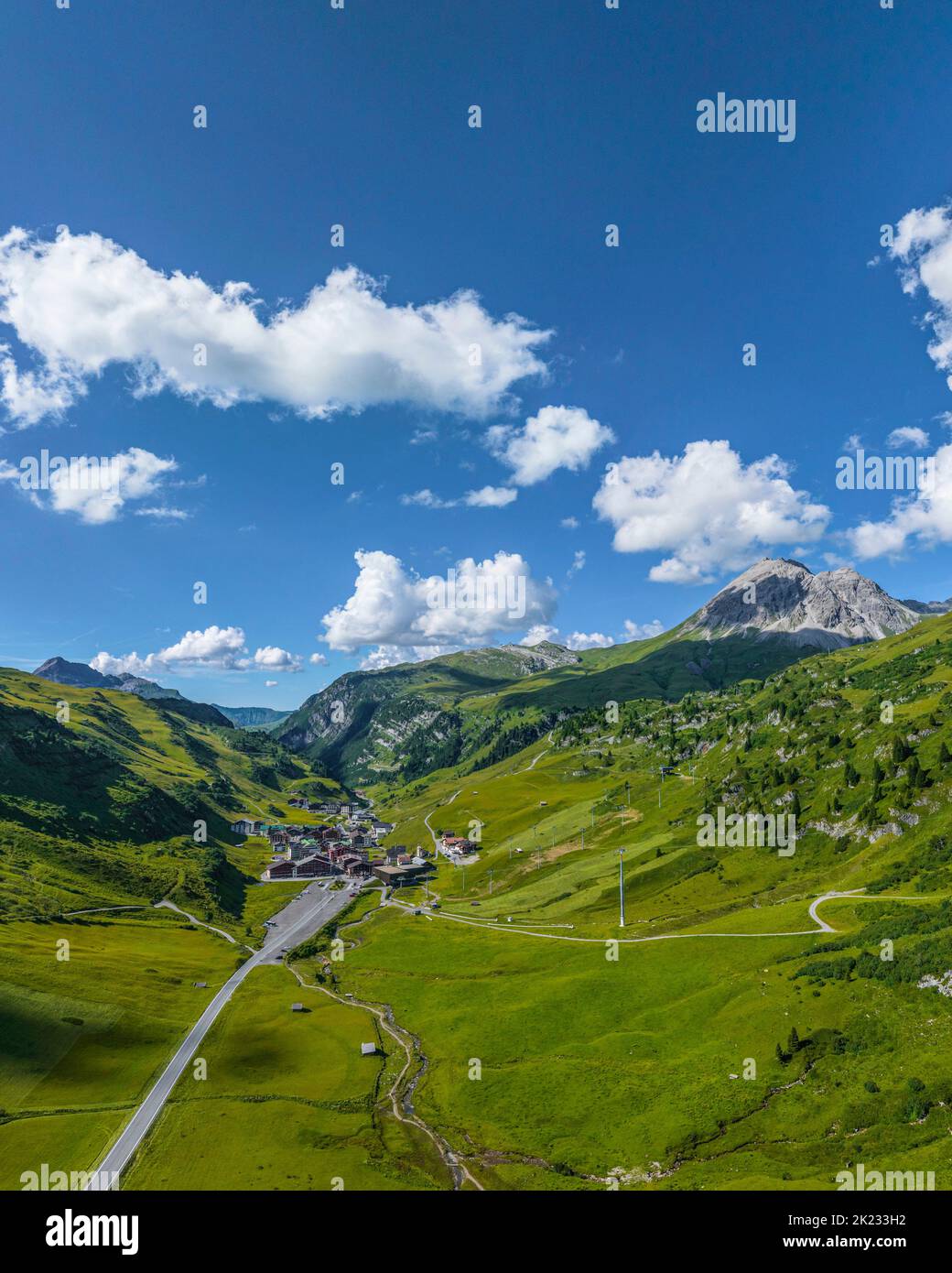 Aerial view to the impressive mountain ranges around the Flexenpass in ...