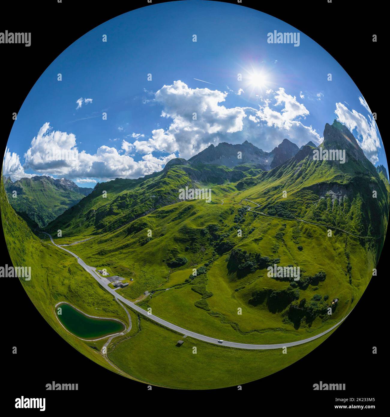 Aerial view to the impressive mountain ranges around the Flexenpass in ...