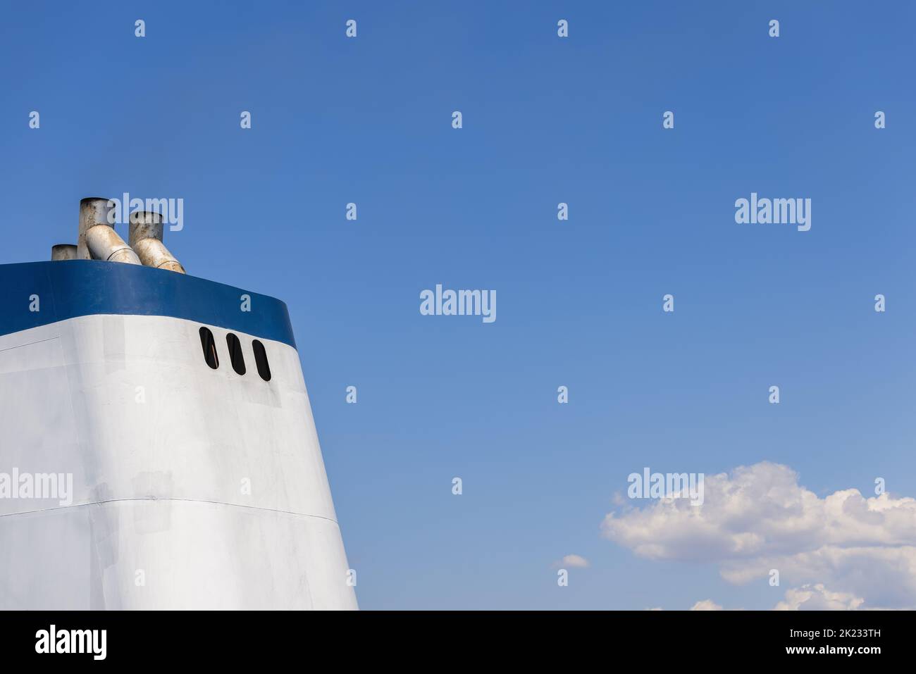 Chimney of Ship releases smoke from oil and diesel fuels combustion ...