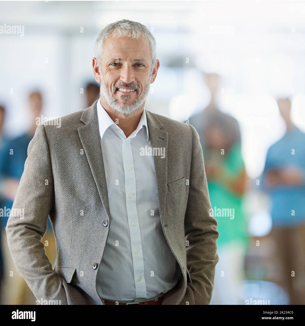 His experience sets him apart. Portrait of a smiling mature man ...