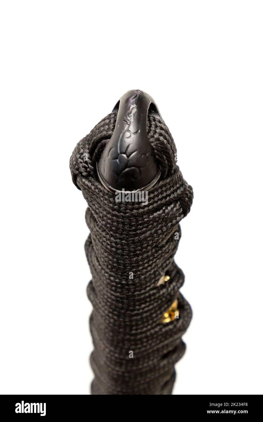 Close up the Kashira: butt cap (or pommel) made of steel on the end of ...