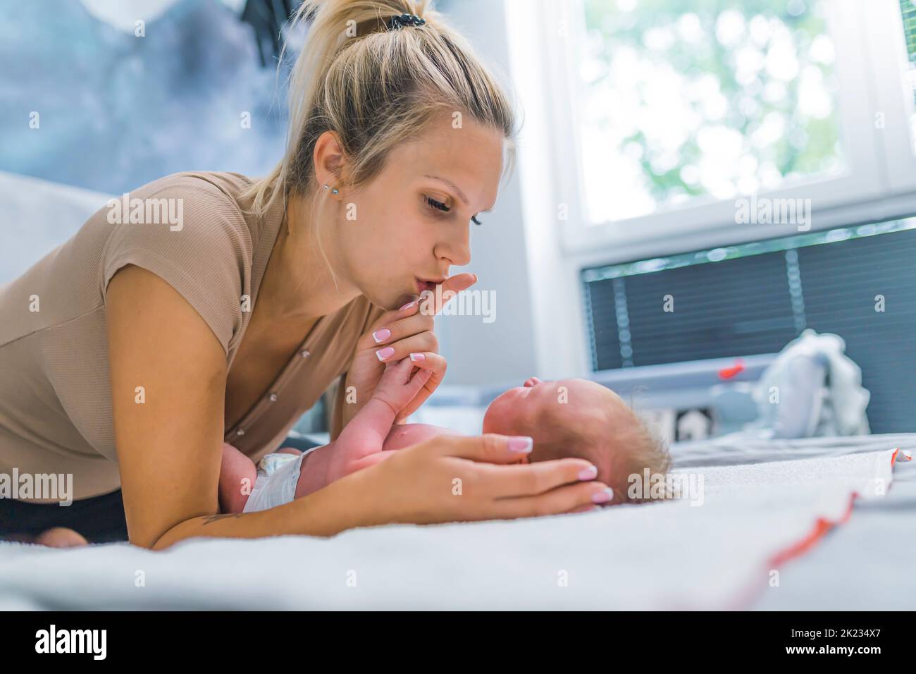 Changing diaper floor hi-res stock photography and images - Alamy