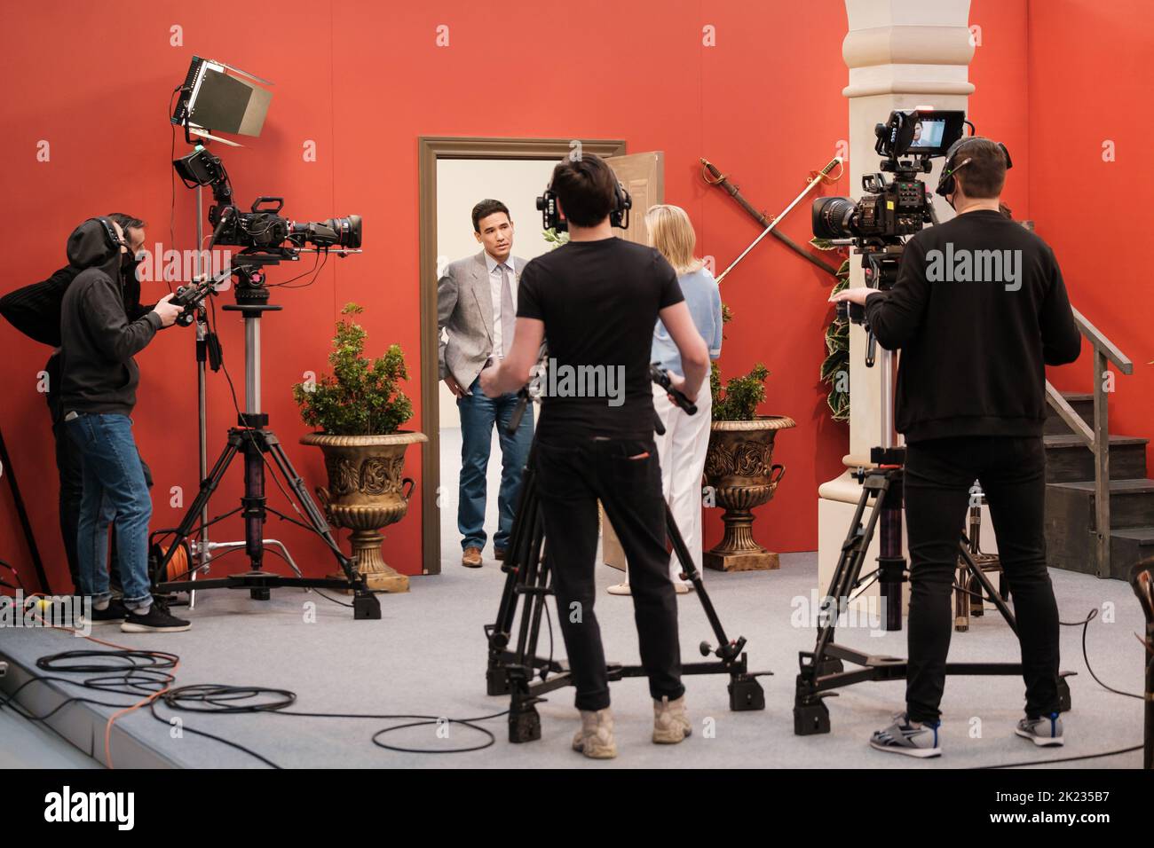 Filmmaking crew shooting scene for movie Stock Photo - Alamy