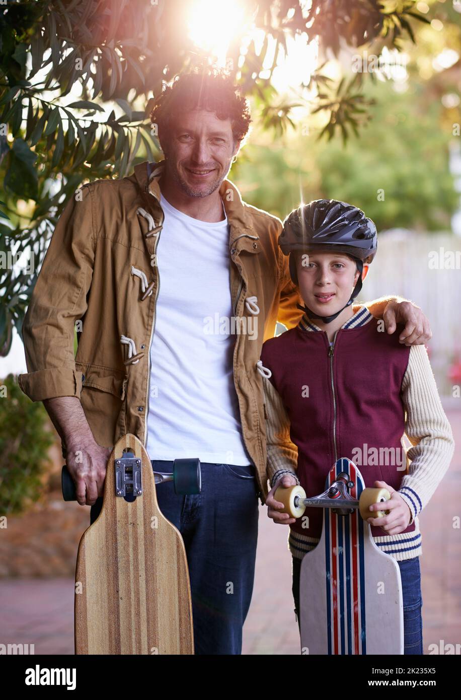 Gonna teach Dad some of my best moves. a father and son getting ready ...