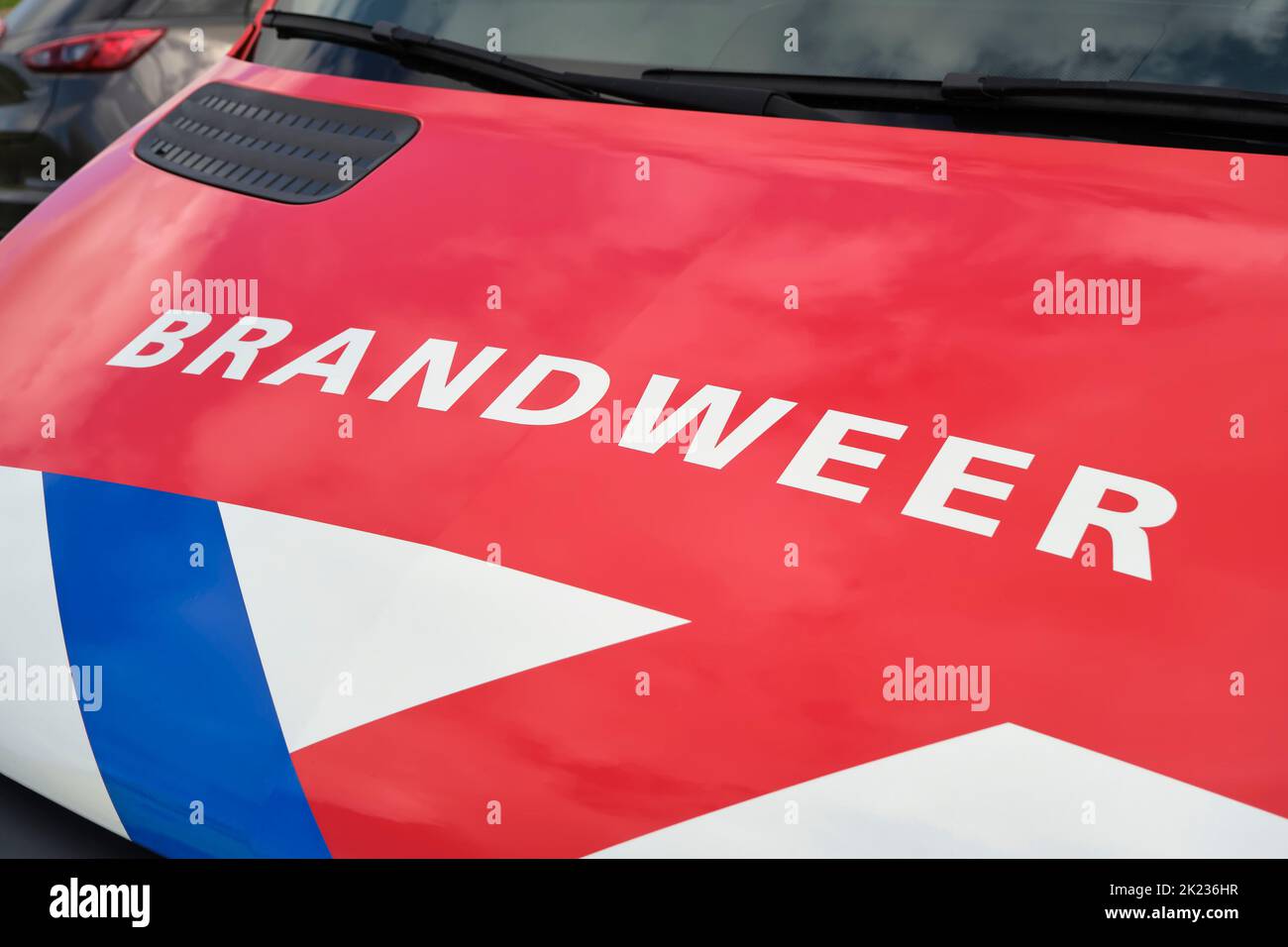 Dutch Fire Department logo on the hood of a car with text Brandweer ...