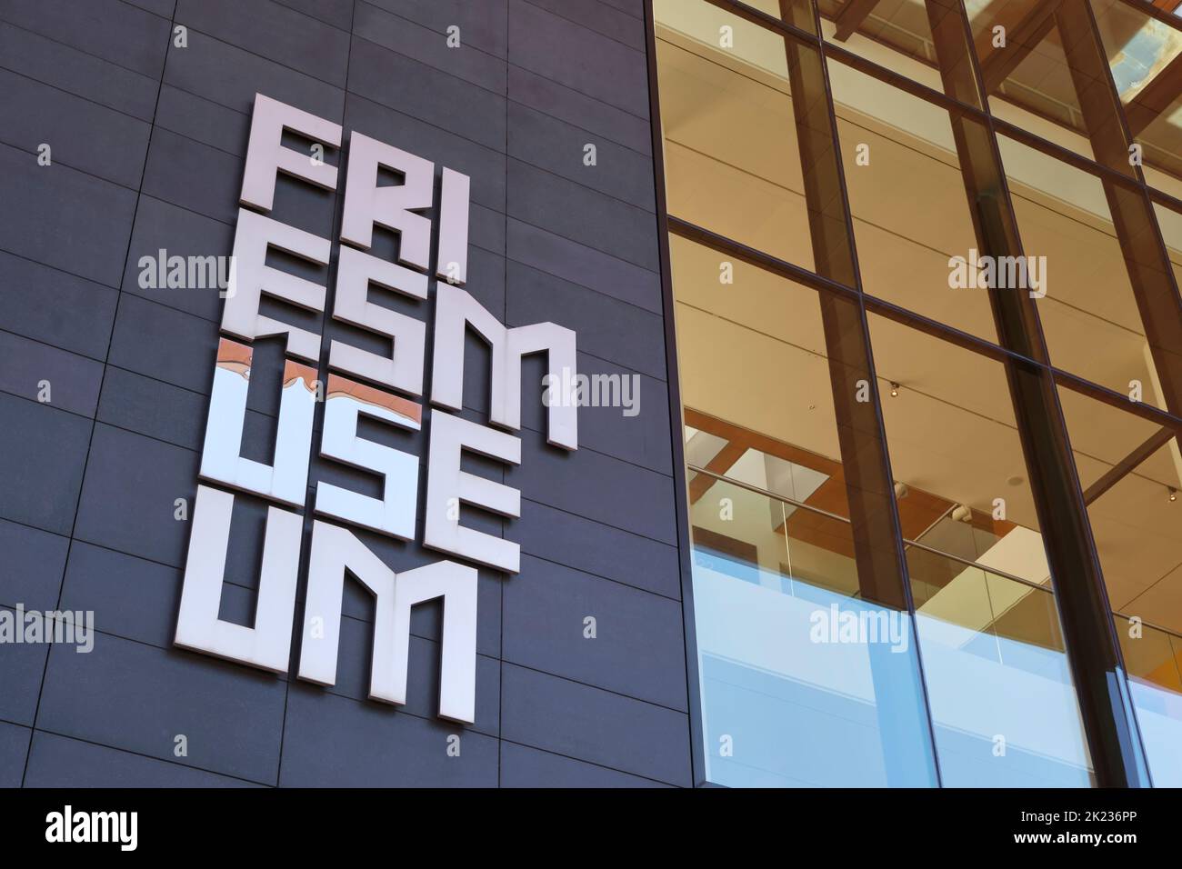 Facade of the Fries Museum with reflective logo. Located in Leeuwarden ...