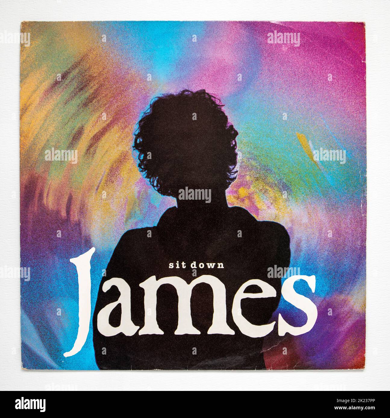 Picture cover of the 12 inch single version of Sit Down by James, which ...