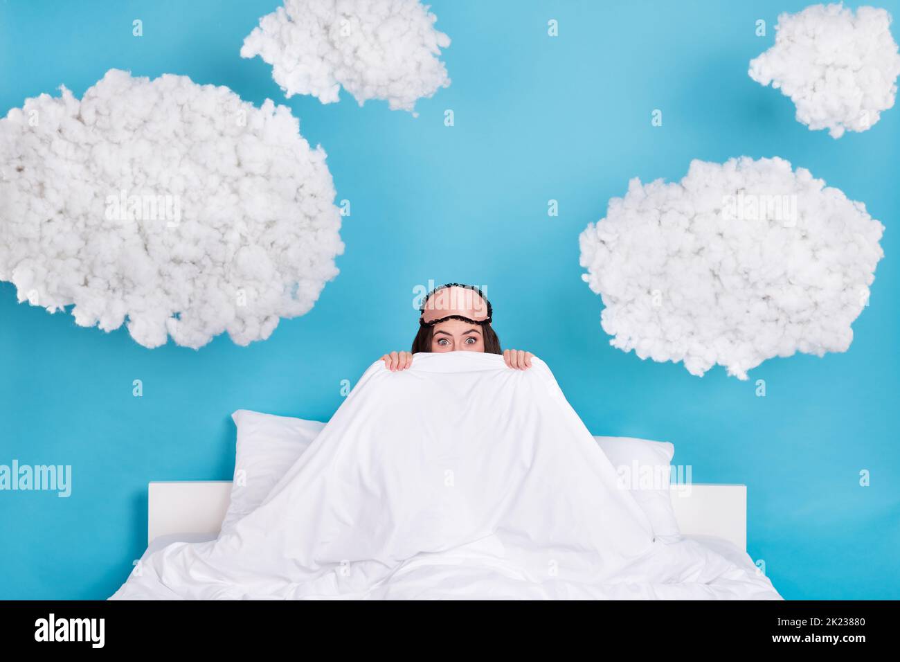 Photo of funky excited woman dressed pink pajama mask sitting bed ...
