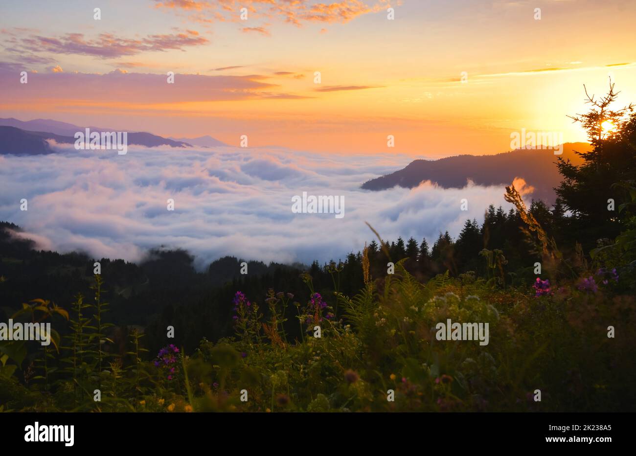 Dramatic sunset time lapse over clouds in Adjara region with clouds ...
