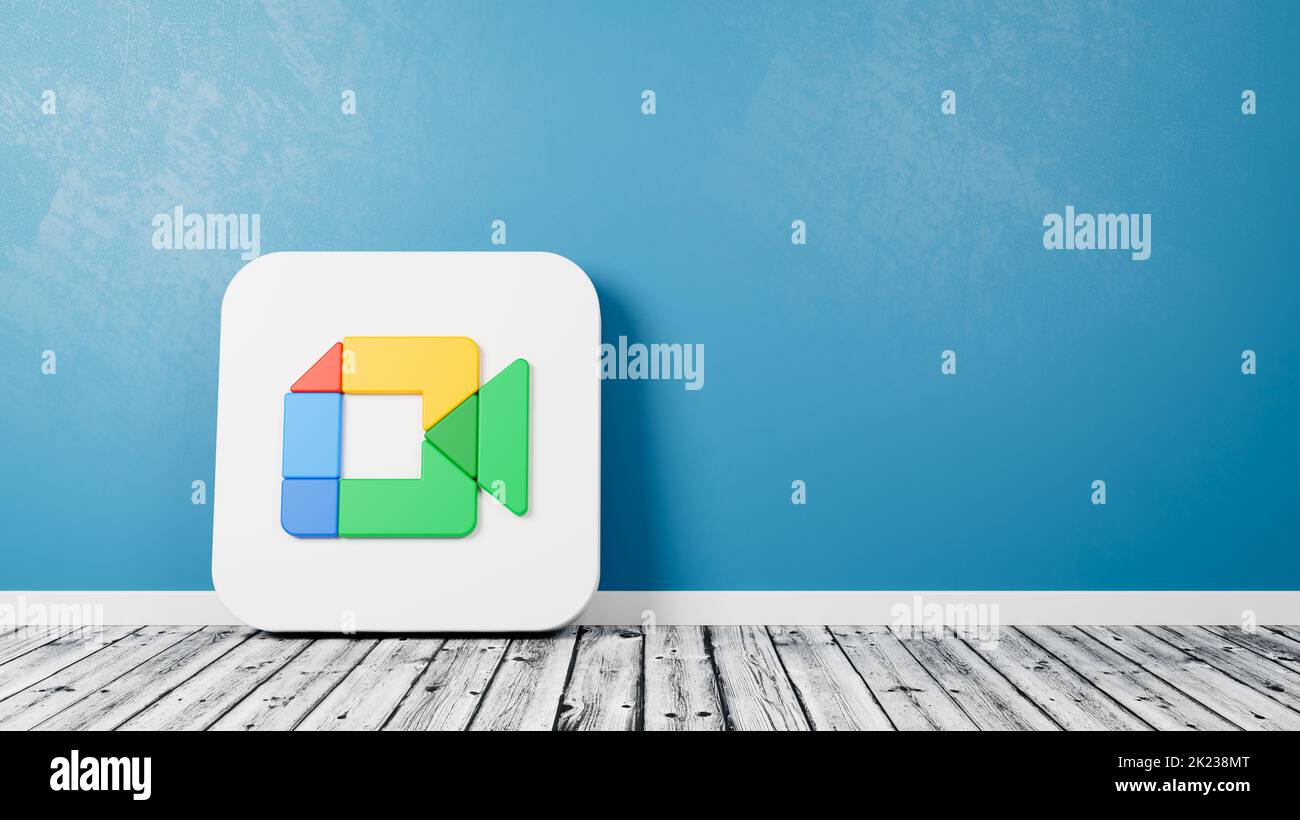 Google Meet Logo on Wooden Floor Against Wall Stock Photo - Alamy