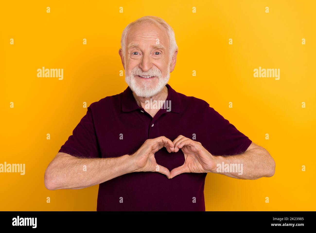 Photo of cute aged grey hairdo man show palms wear blueberry t-shirt ...