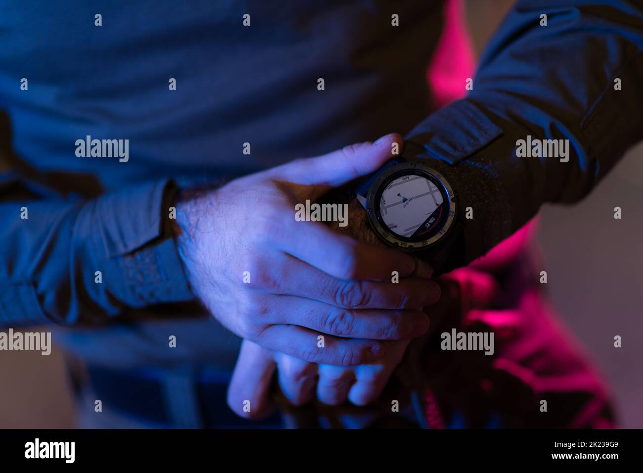 Modern warfare soldier checking navigation, time and other information ...