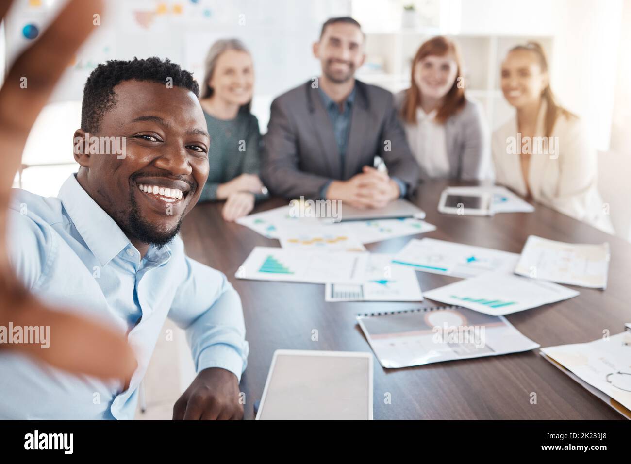 Diversity, business people and selfie in corporate meeting at the ...