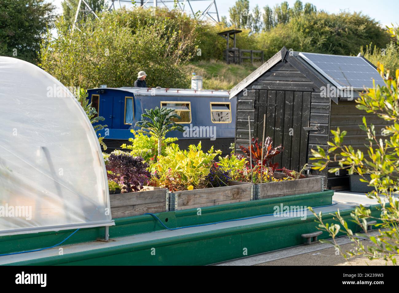 An allotment barge moored on the historic Forth and Clyde Canal at The ...