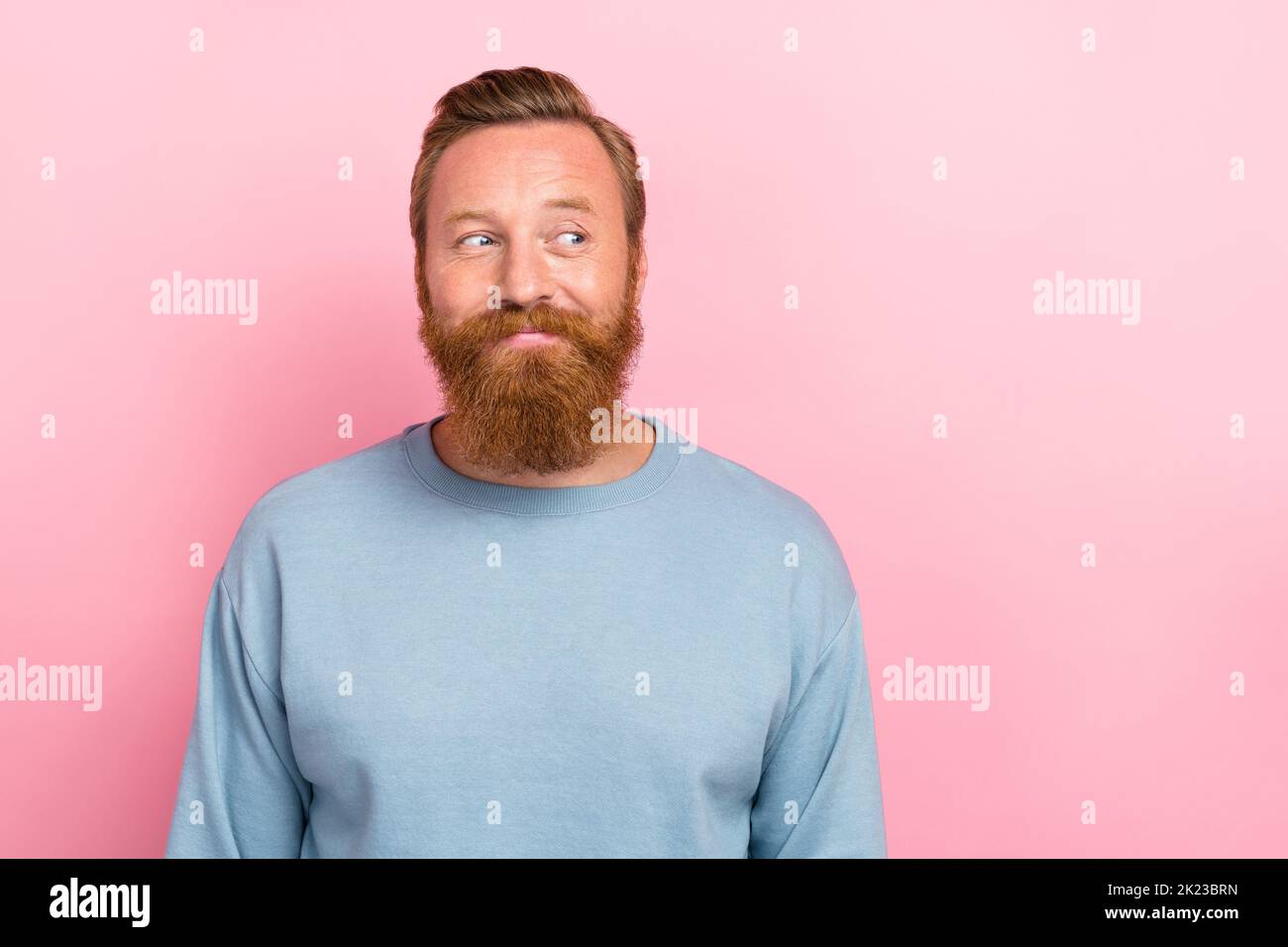 Portrait photo of young attractive handsome redhair bearded guy look positive satisfied empty ...