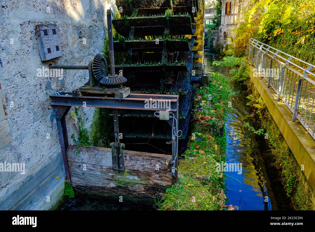 Symbolic image of a historic mill wheel and the concept of water energy ...