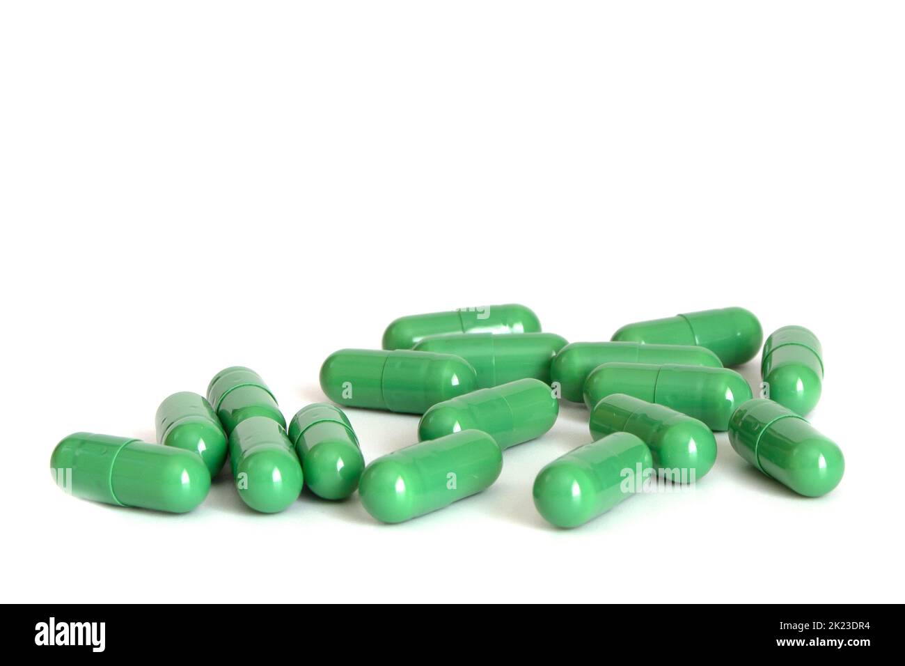 Green pills. Capsule pile isolated, drugs set, pill collection ...