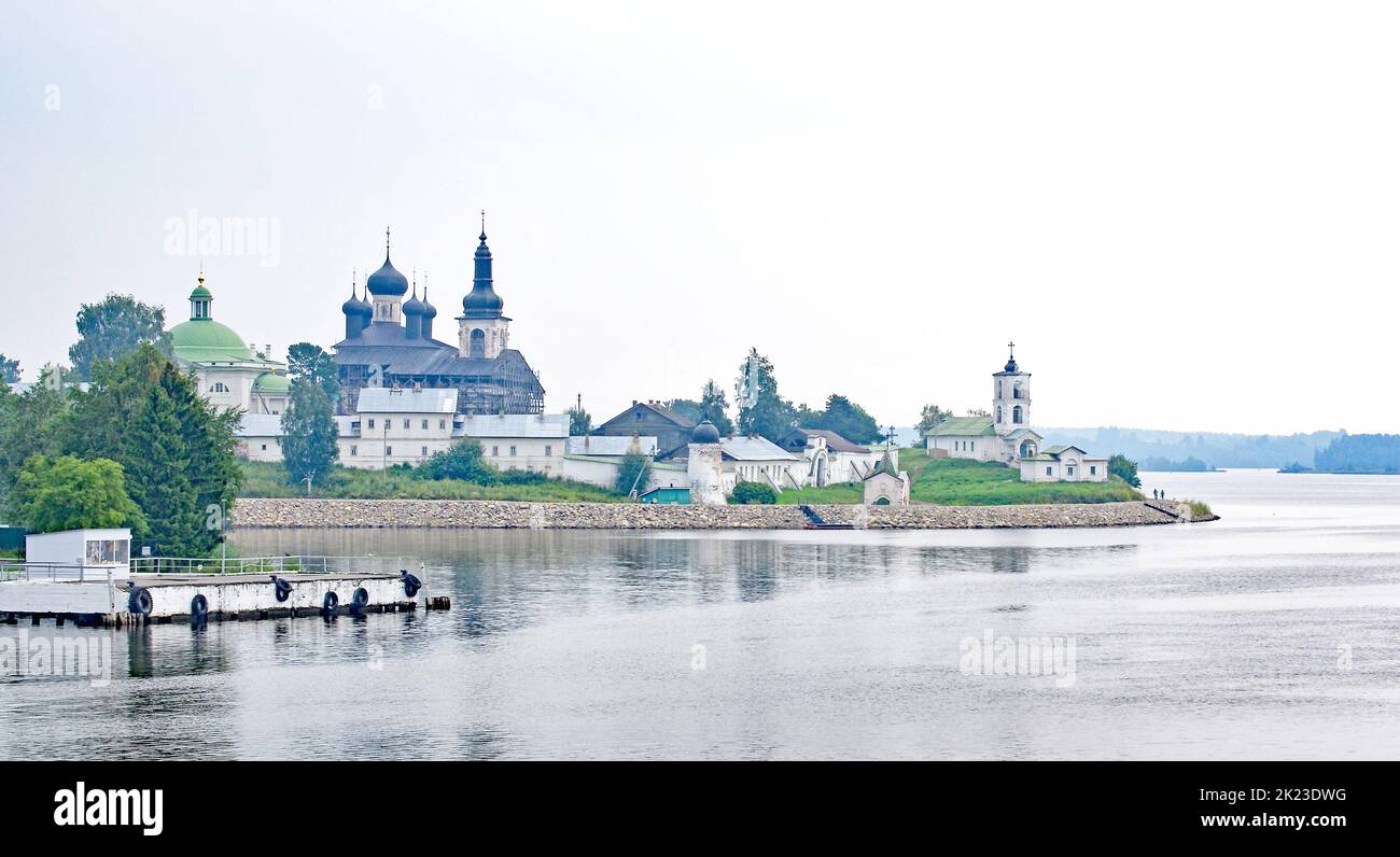 Classic buildings and cranes on the banks of the Volga as it passes ...