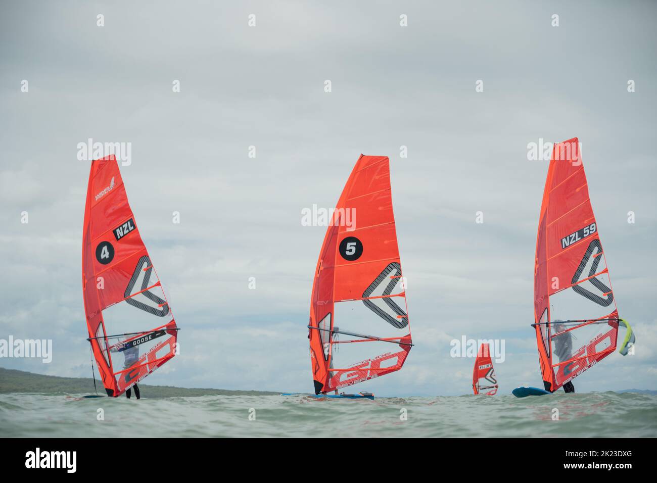Competitors race in a national windsurfing hydrofoil race at the ...