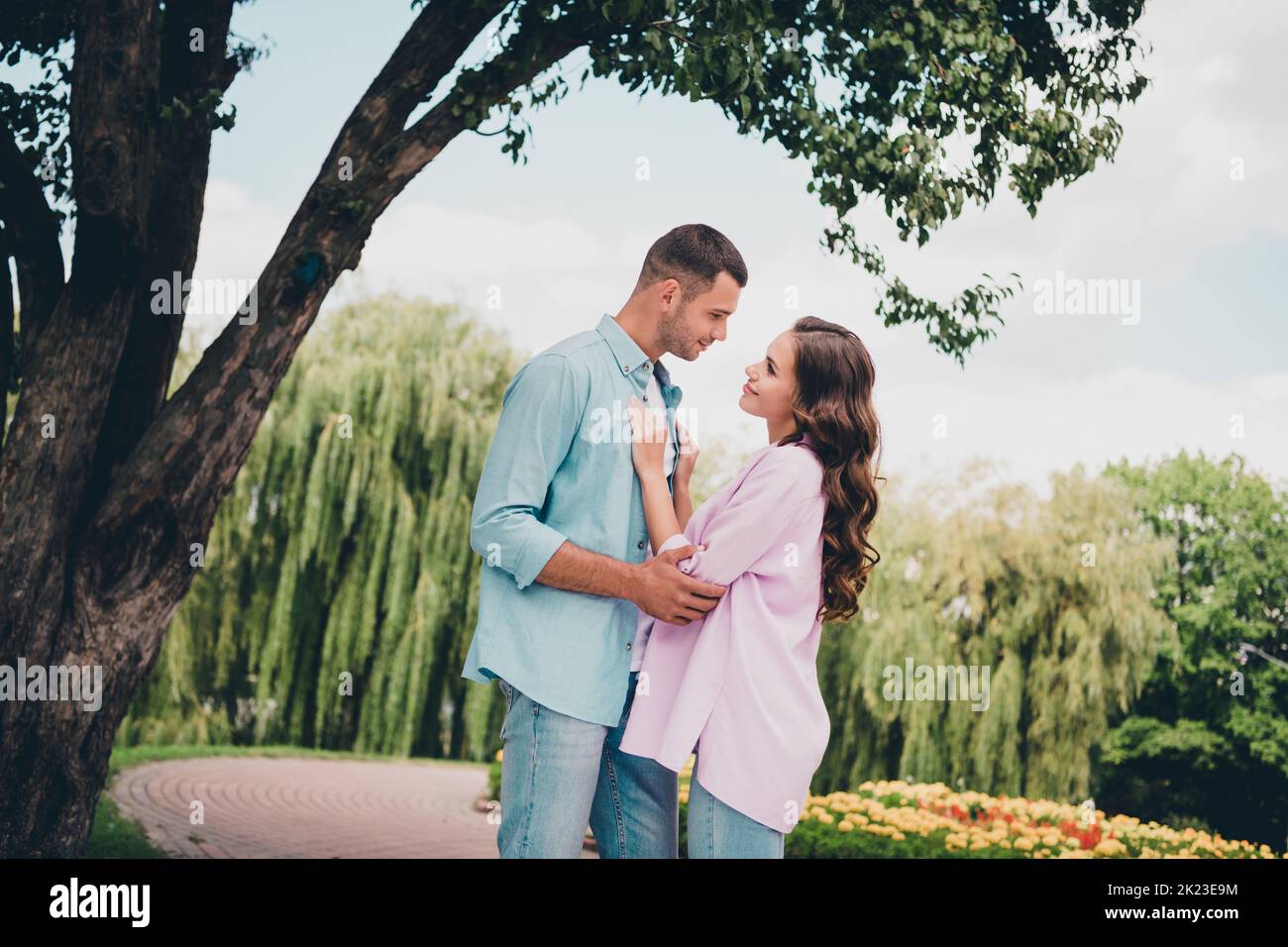 Profile photo of pretty lovely lady positive guy cuddle look each other ...