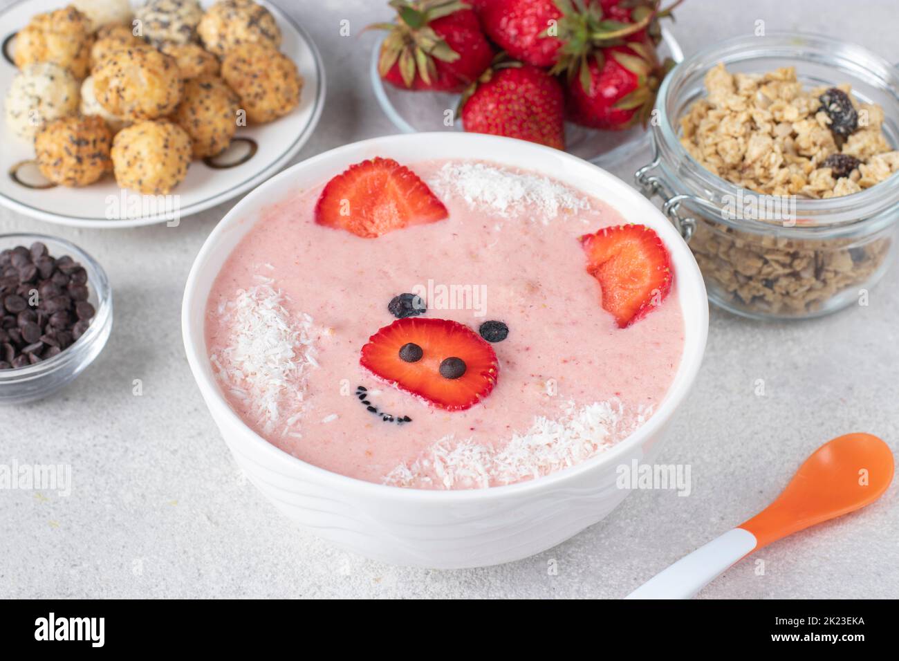 Fun food for kids - smoothie-bowl in shape funny piglet, with ...
