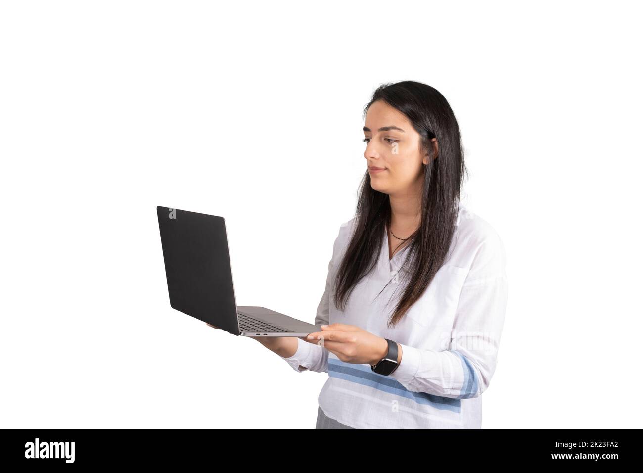Woman holding modern laptop, portrait of young woman holding modern ...