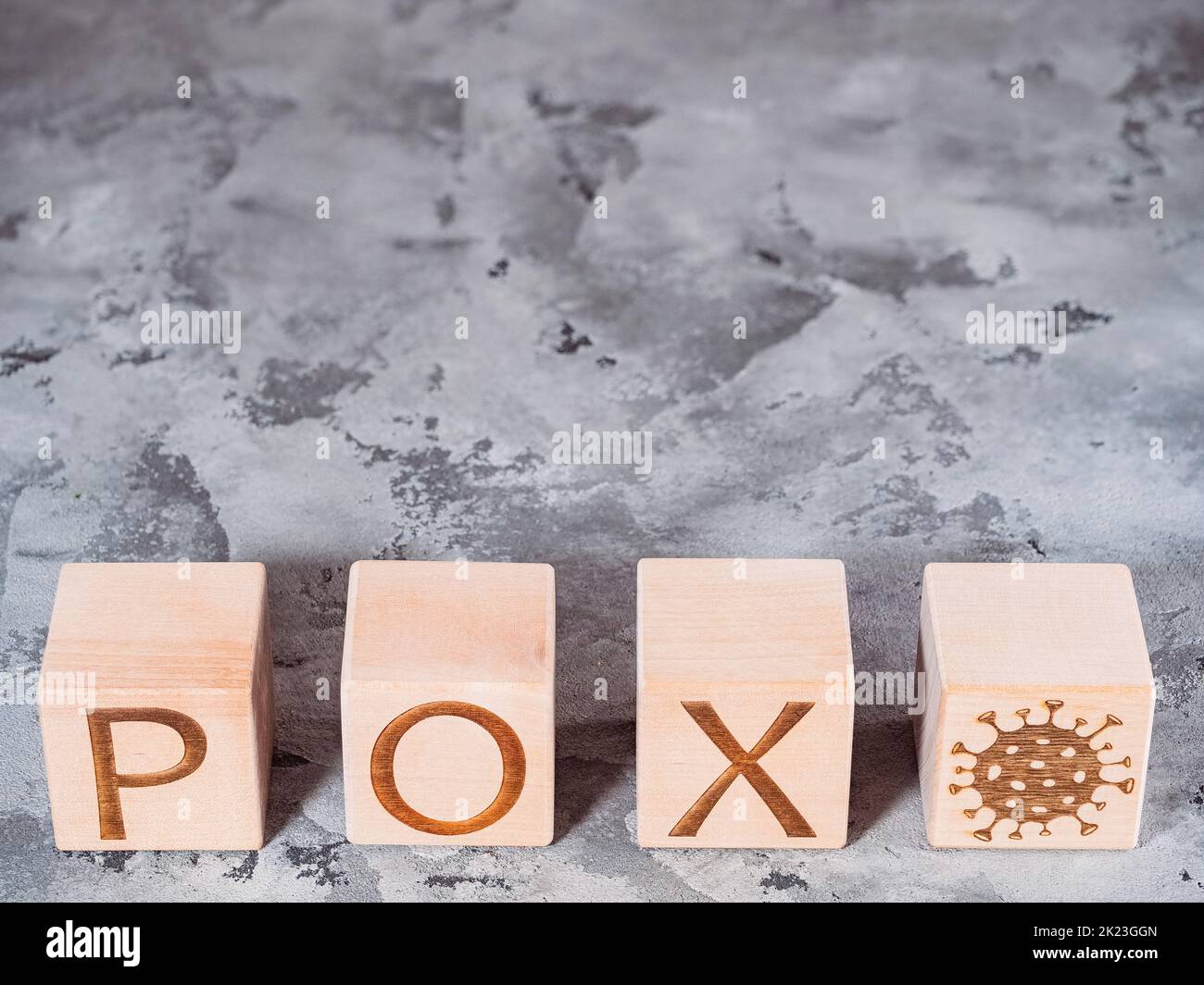 Epidemic or spread of disease concept as POX inscription on wood blocks ...