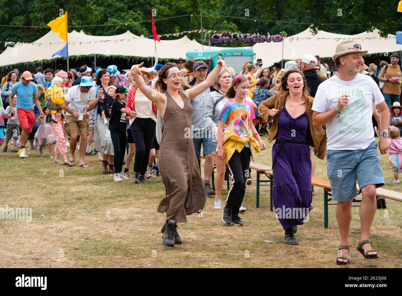 Musical chairs comedy party games with families at the Green Man 2022 ...