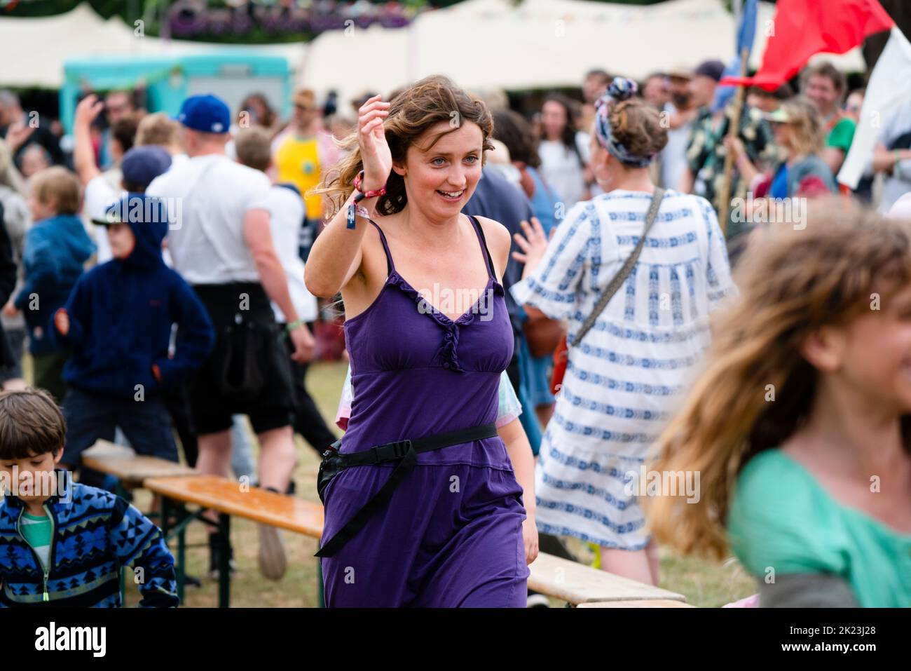 Musical chairs comedy party games with families at the Green Man 2022 ...