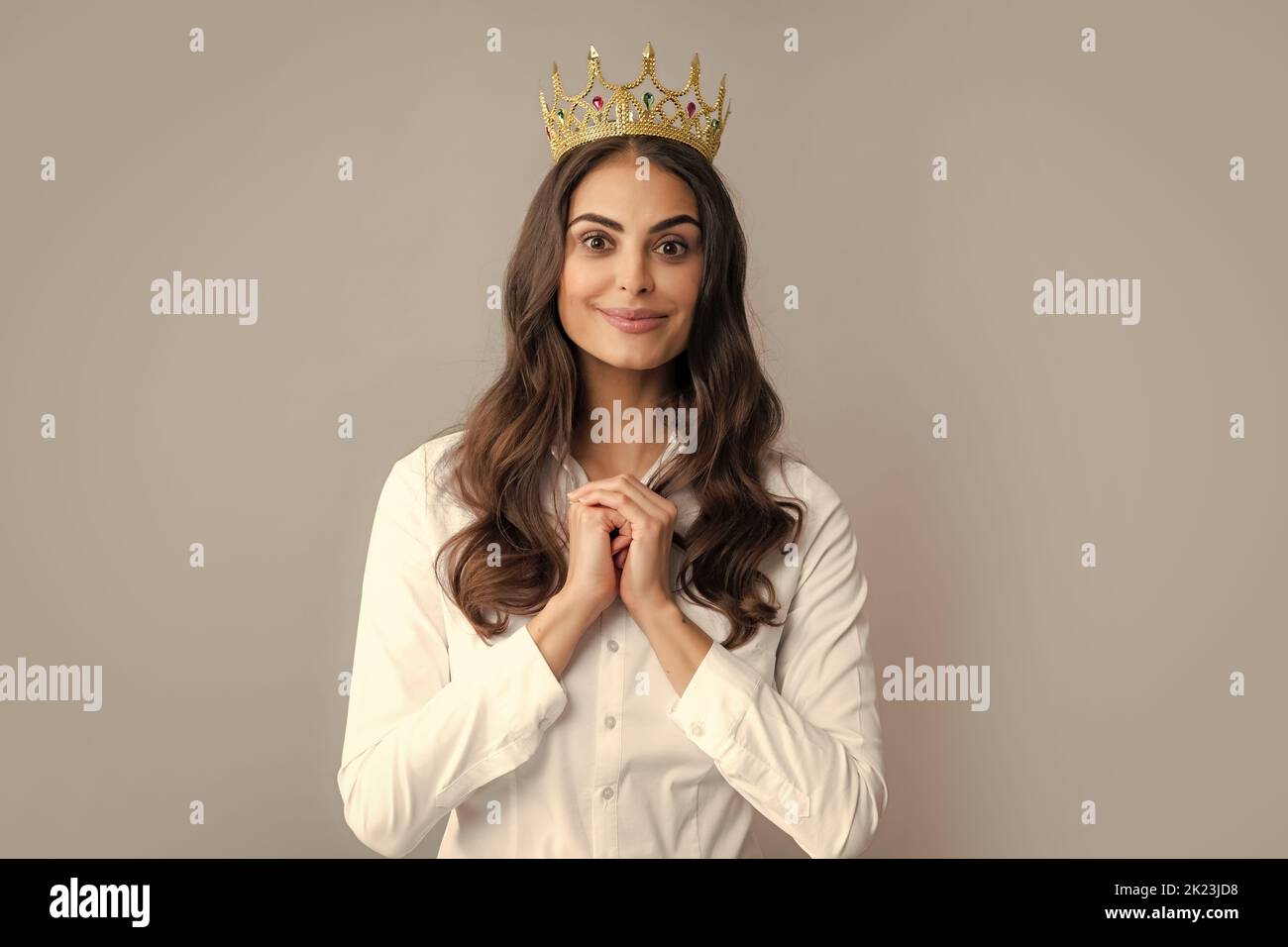 Portrait of arrogance woman with golden crown on head, leadership and ...
