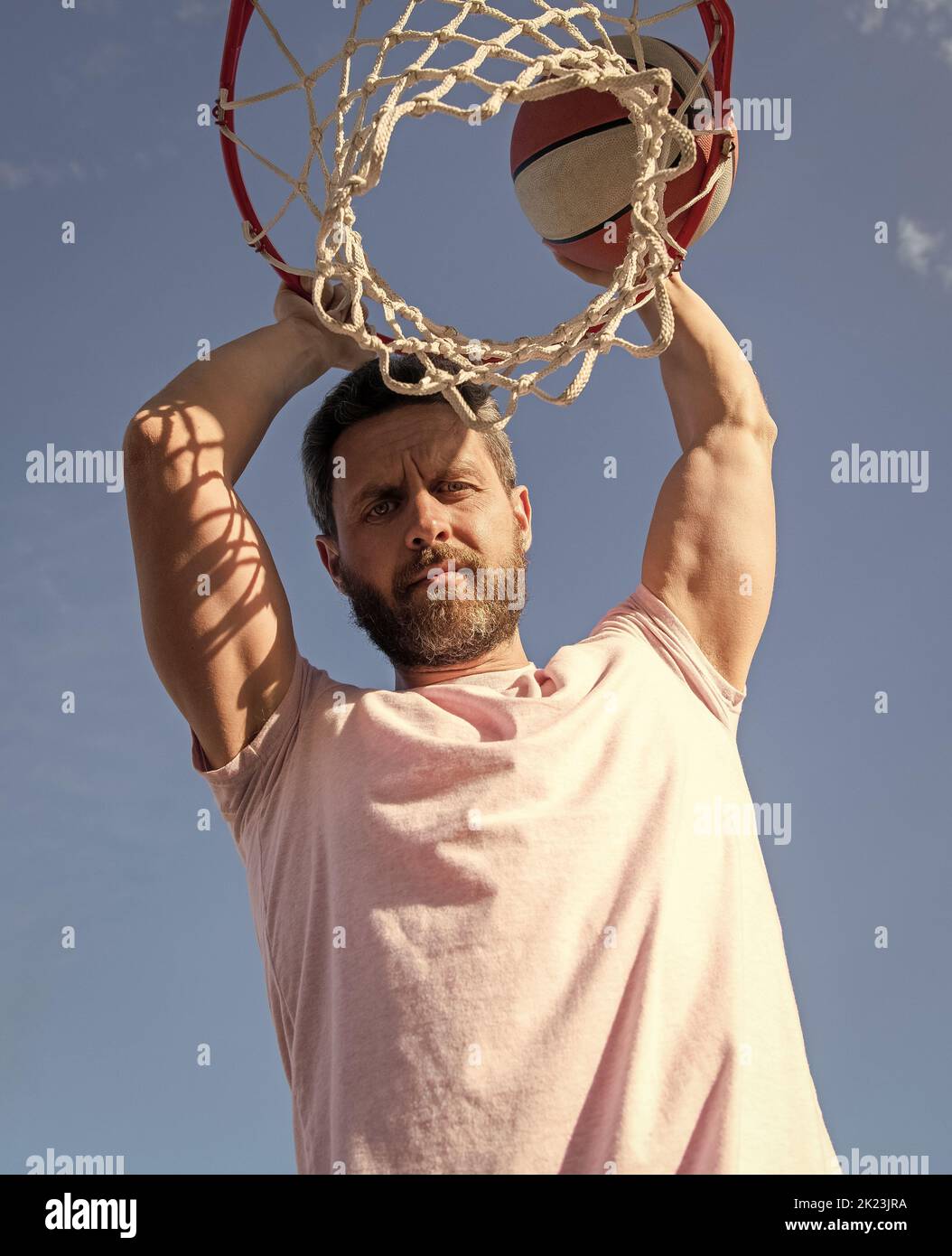 guy has sport motivation. sport and hobby. dunk in basket. slam dunk in ...