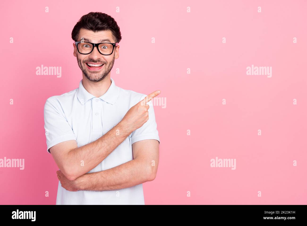 Photo of young attractive positive excited handsome student man wear ...