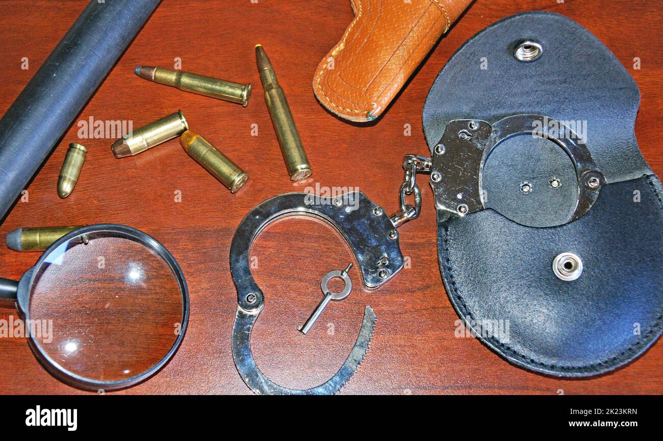 Security and defense police accessories on desk Stock Photo - Alamy