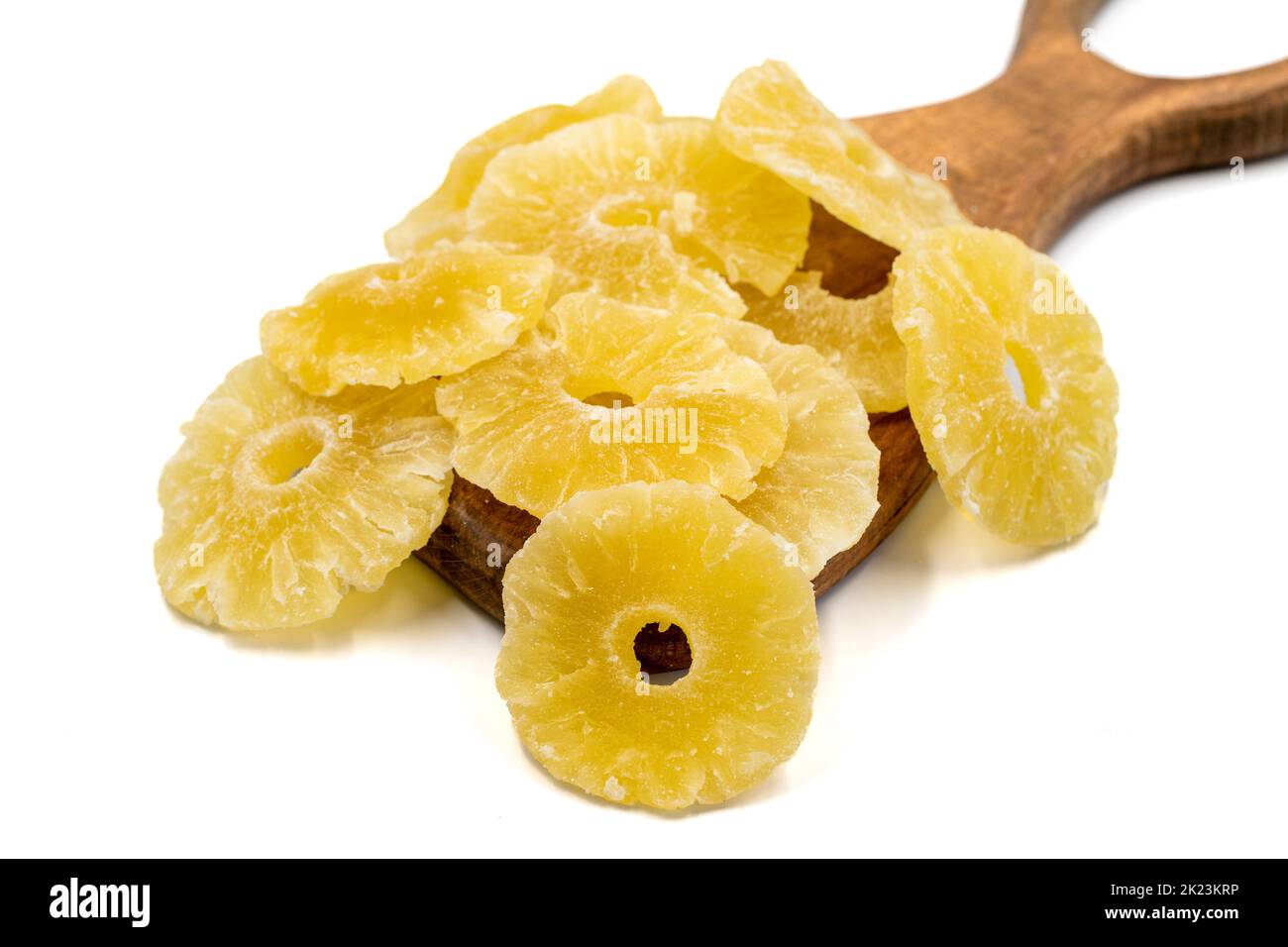 Dried pineapple slice isolated on white background. Dried fruit in sunlight. close up Stock ...