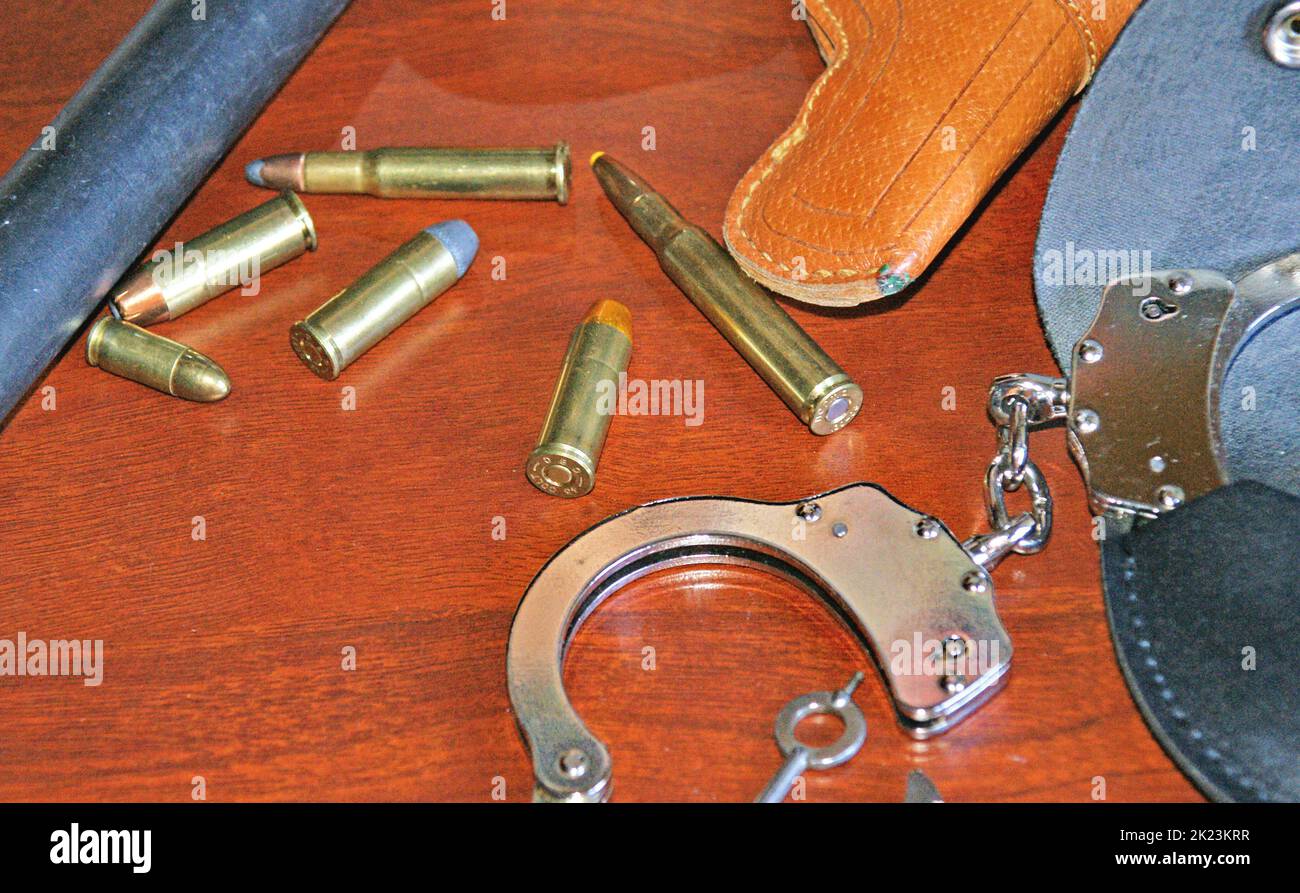 Security and defense police accessories on desk Stock Photo - Alamy