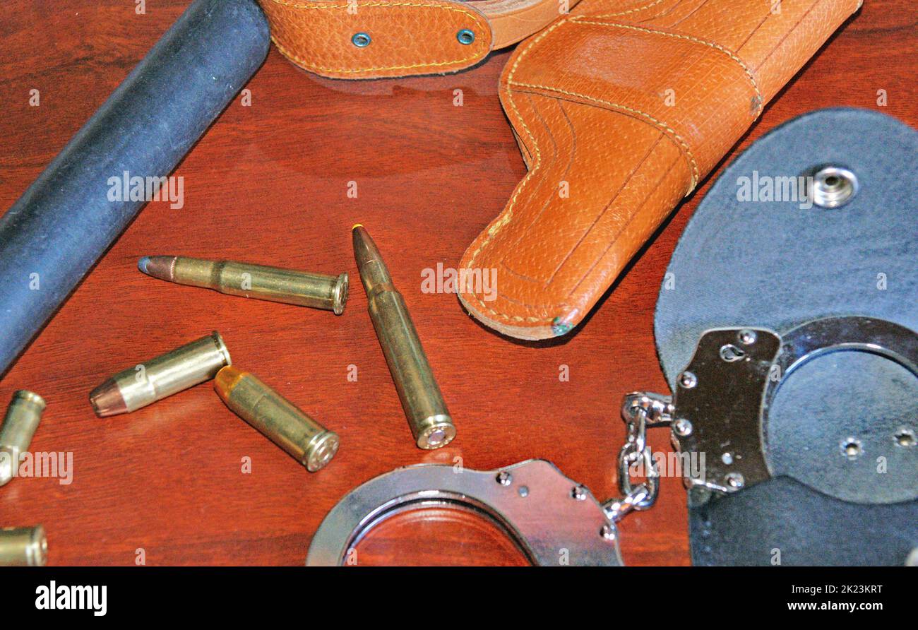 Security and defense police accessories on desk Stock Photo - Alamy
