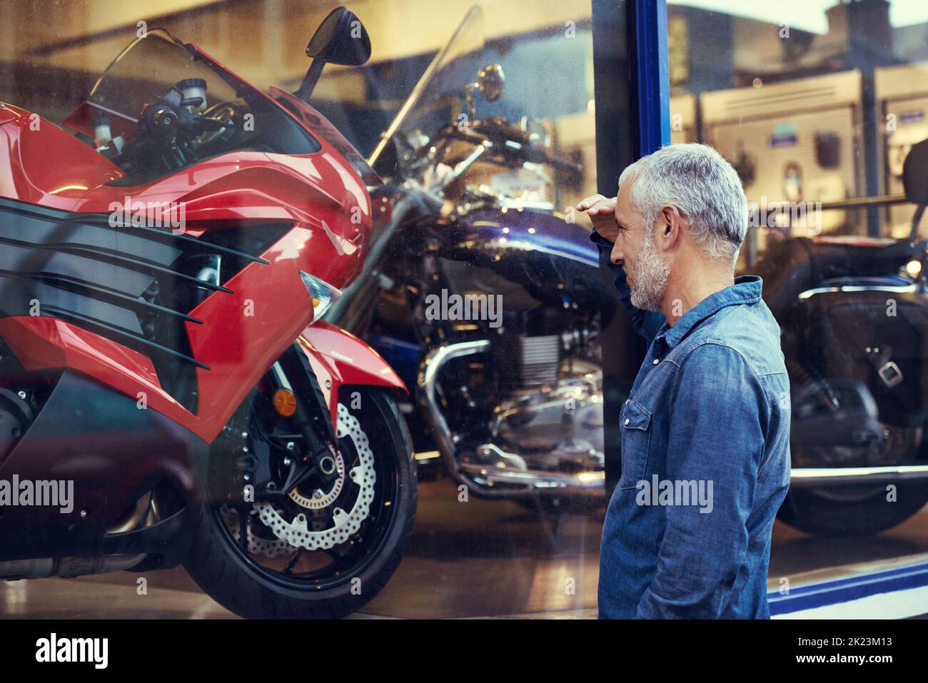 Man posing motorcycle hi-res stock photography and images - Alamy