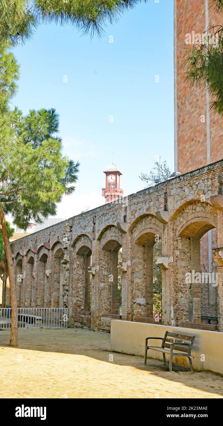 Arches and columns with fountain and pond in El Clot park, Barcelona ...
