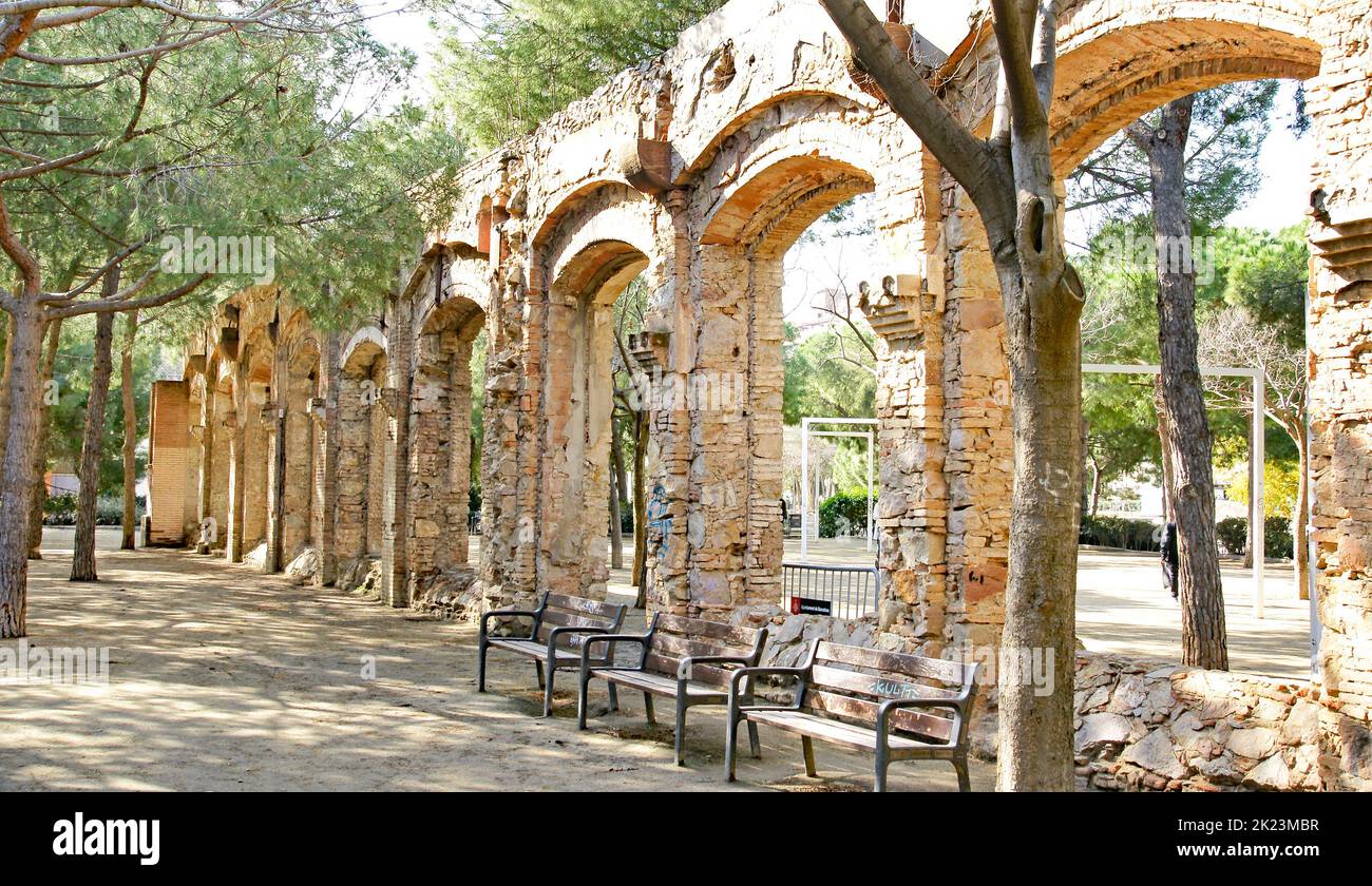 Arches and columns with fountain and pond in El Clot park, Barcelona ...
