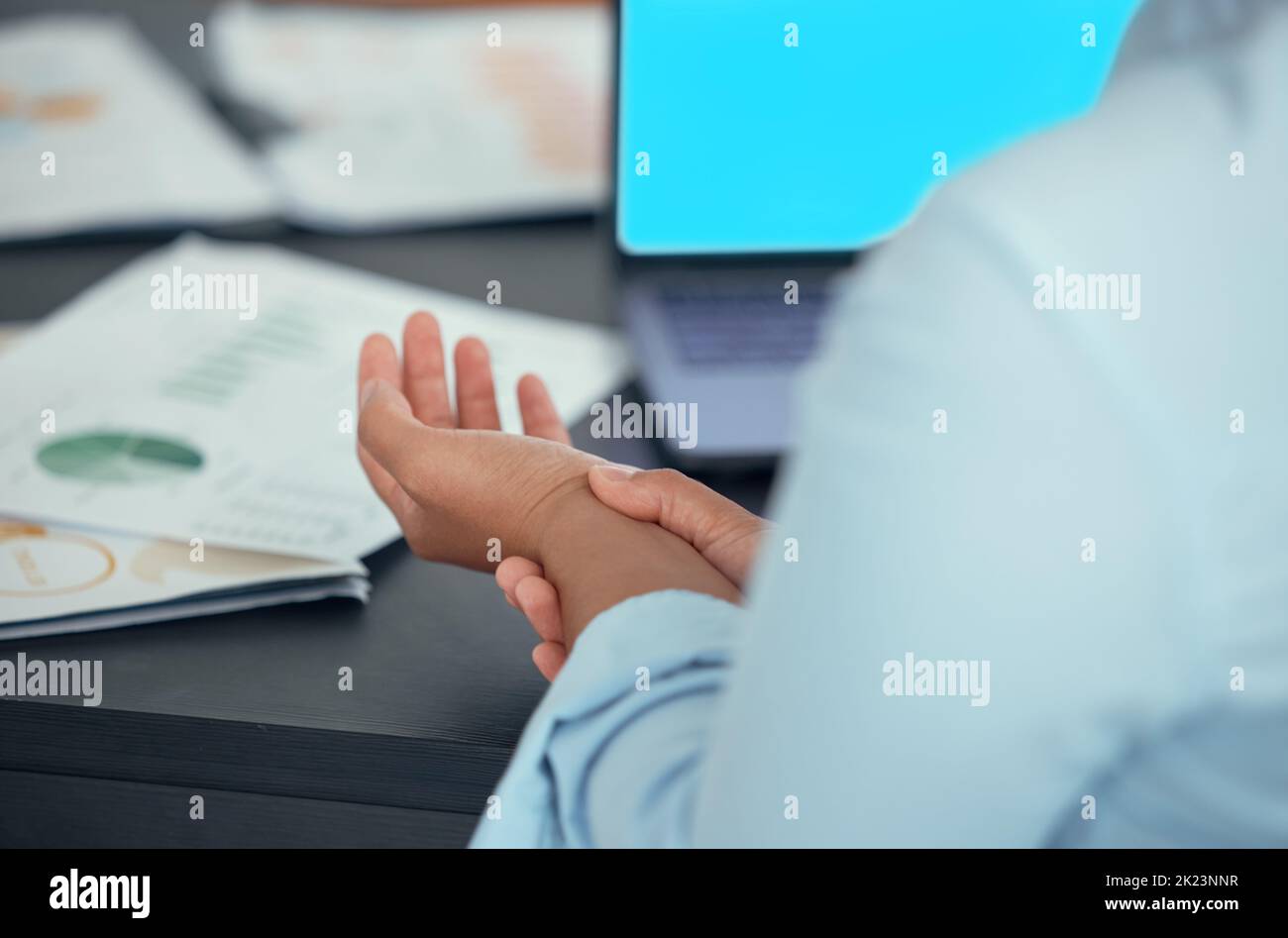 Injury, hand and business woman with wrist pain while working on a ...