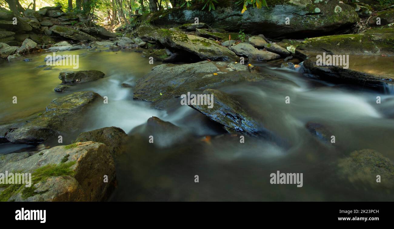Stream running fast over boulders in a forest near Boone North Carolina ...