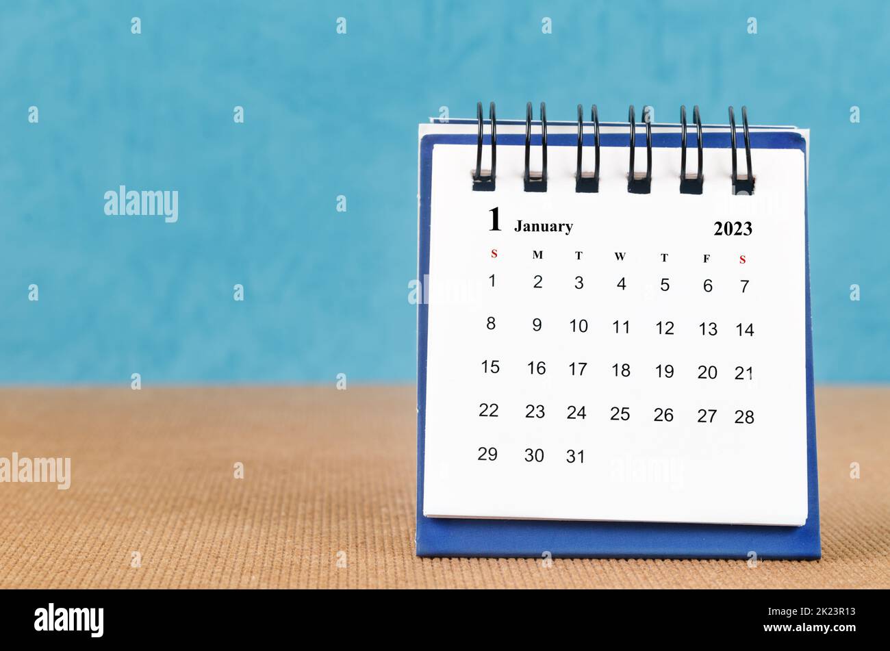 January 2023 desk calendar on blue color background Stock Photo - Alamy