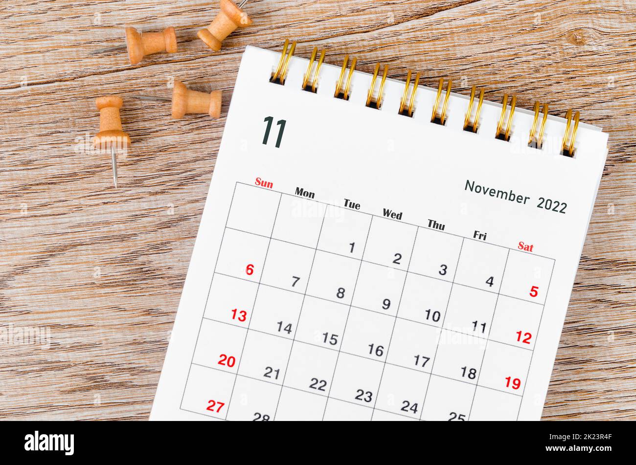 November 2022 Monthly desk calendar for 2022 year and wooden push pin ...