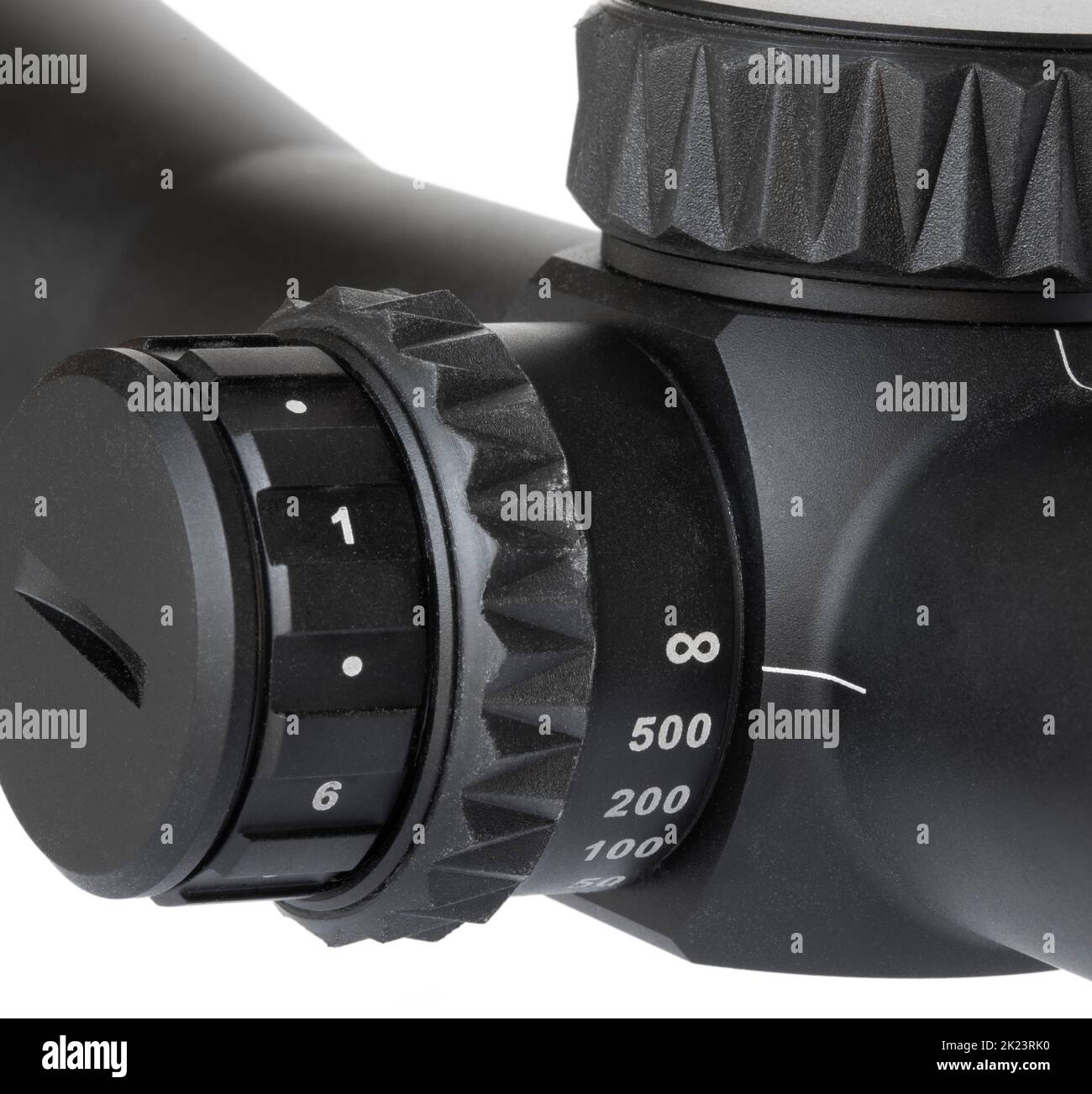 Parallax dial on a riflescope adjusted to infinity isolated on a white ...