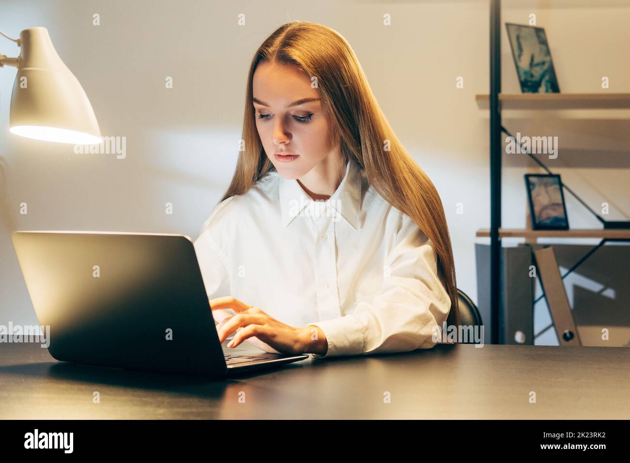 Night work. Remote job. Freelancer lifestyle. Late task. Serious smart ...