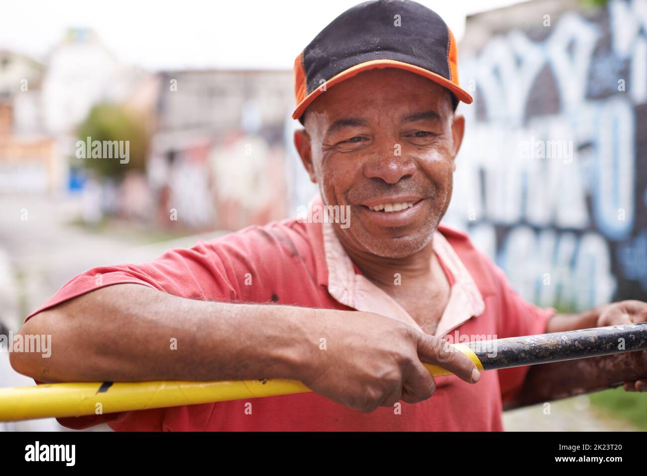 Successful day on the road. Portrait of a garbage collector with his ...